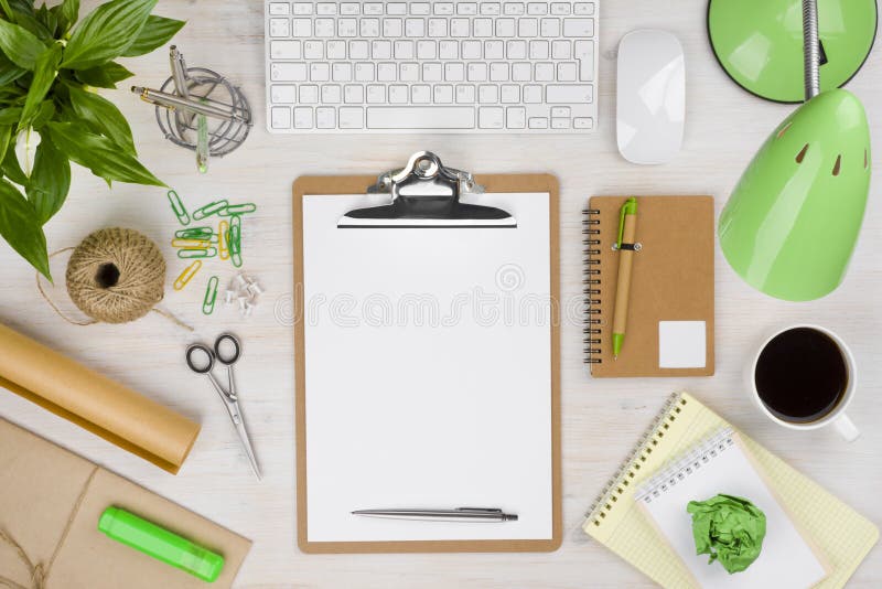 Office Table with Paper Holder in Center and Various Supplies Stock ...