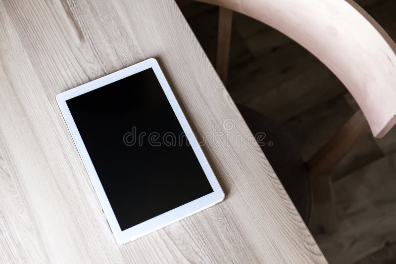 Office Table with Tablet Pc and Wooden Chair Stock Photo - Image of ...
