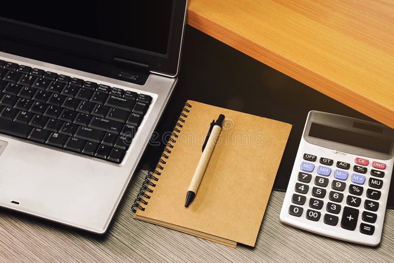 Office Table, Workplace with Laptop and Calculator on Wood Table. Stock ...