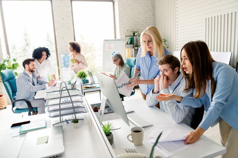 Office Team Collaborating on a Project, Diverse Group Reviewing Data ...