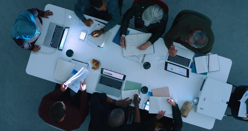 Office Team Planning a Strategy and Working at Night with Teamwork ...