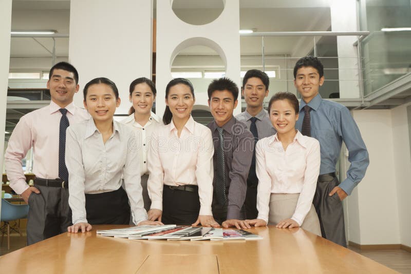 Office Team Standing Near the Desk, Portrait Stock Image - Image of ...