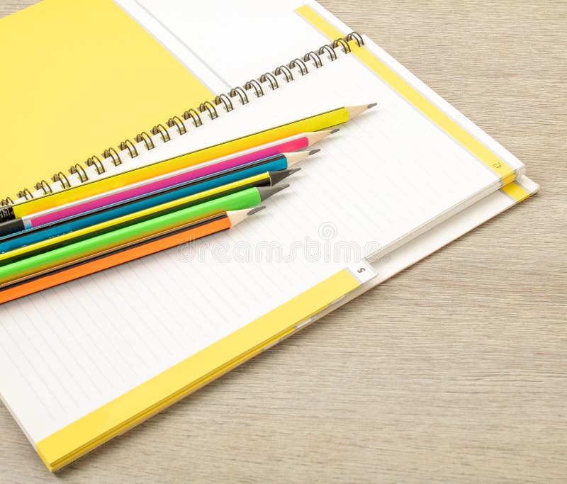 Office Theme. Simple Pencils with a Multi-colored Shell Lie on an Open ...