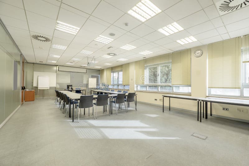 Office with a Training Room with a U-shaped Table Filled with Chairs ...