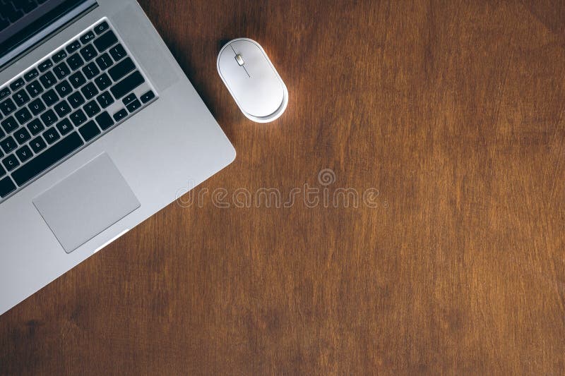 Office Wooden Desk with Laptop and Computer Mouse on the Table, Top ...