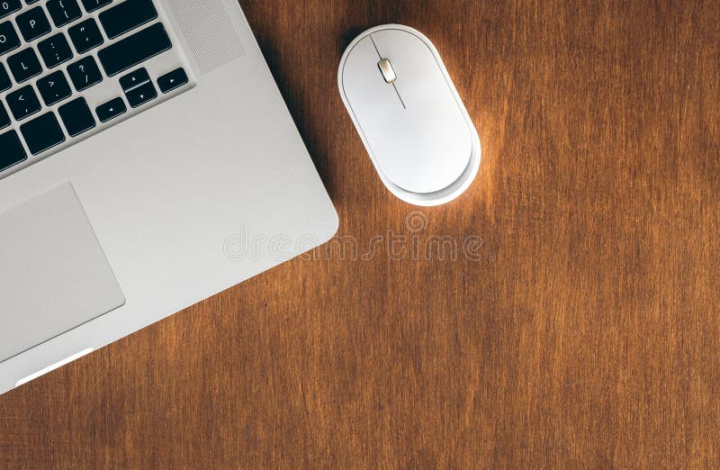 Office Wooden Desk with Laptop and Computer Mouse on the Table, Top ...