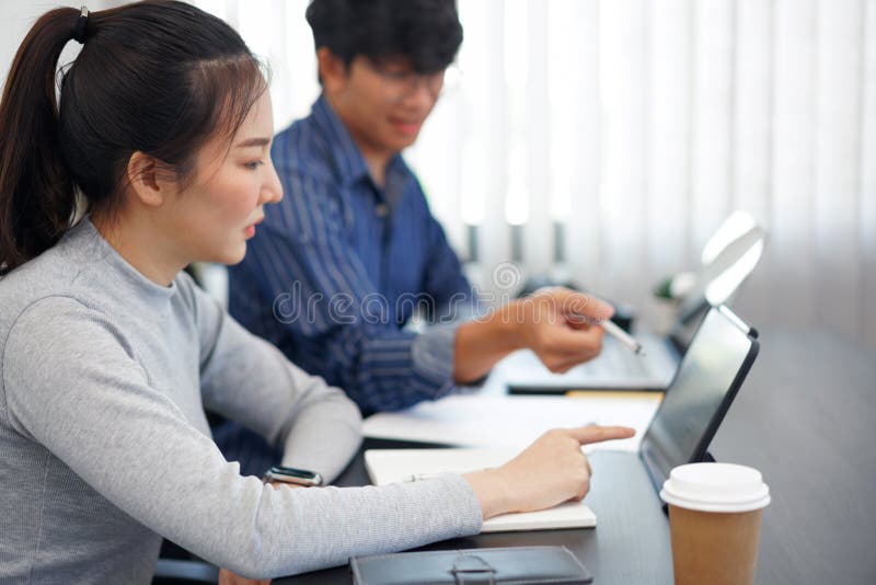 Office Work Concept Two Business Partners Watching a Tablet Screen and ...