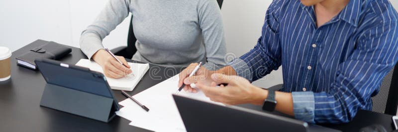 Office Work Concept Two Business Partners Watching a Tablet Screen and ...