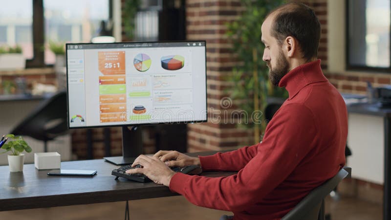 Office Worker Analyzing Executive Project To Create Research Statistics ...