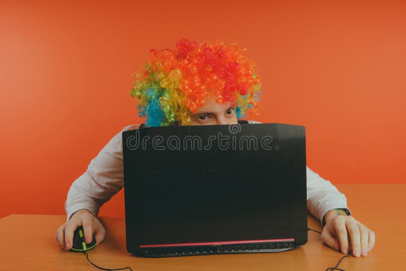 Office Worker in Clown Wig, Clown Concept at Work. Stock Photo - Image ...