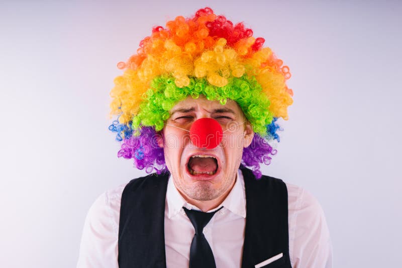 Office Worker in Clown Wig, Clown Concept at Work. Businessman with ...