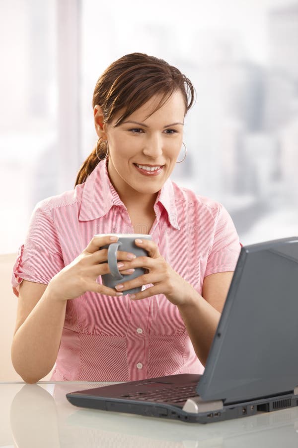 Office Worker Drinking Tea at Desk Stock Photo - Image of adult, female ...