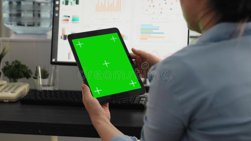 Office Worker Vertically Holding Digital Device with Greenscreen Stock ...