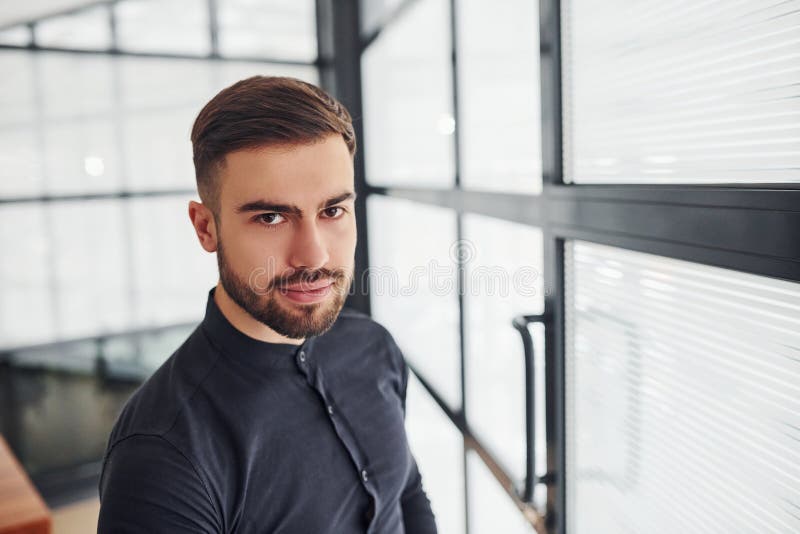 Office Worker in Formal Clothes Standing Indoors at Daytime Stock Image ...