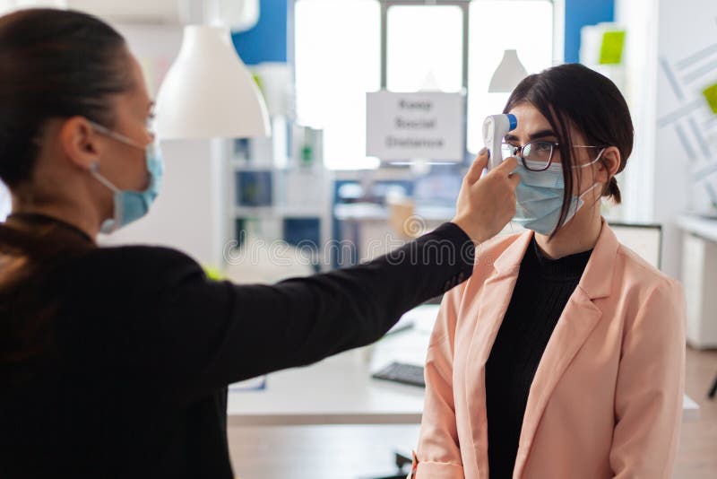 Office Worker Getting Body Temeperature Checked with Digital ...