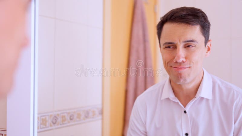Businessman Smiling at Himself, Getting Ready for Work Stock Image ...