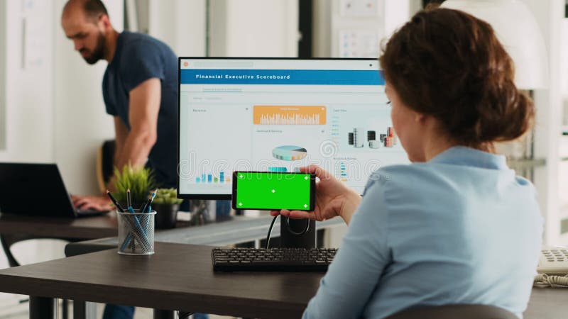 Office Worker Vertically Holding Digital Device with Greenscreen Stock Footage - Video of ...