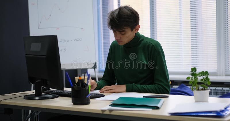 Office Worker Making Notes, Making a Mistake, Crumple it and Throwing ...