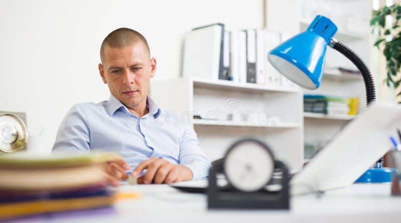 Office Worker Messing Around - Playing with Coin while Sitting at Table ...