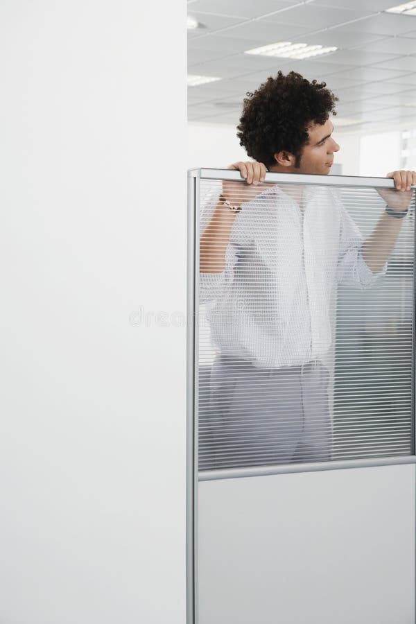 Office Worker Peering Over Cubicle Wall Stock Image - Image of ...