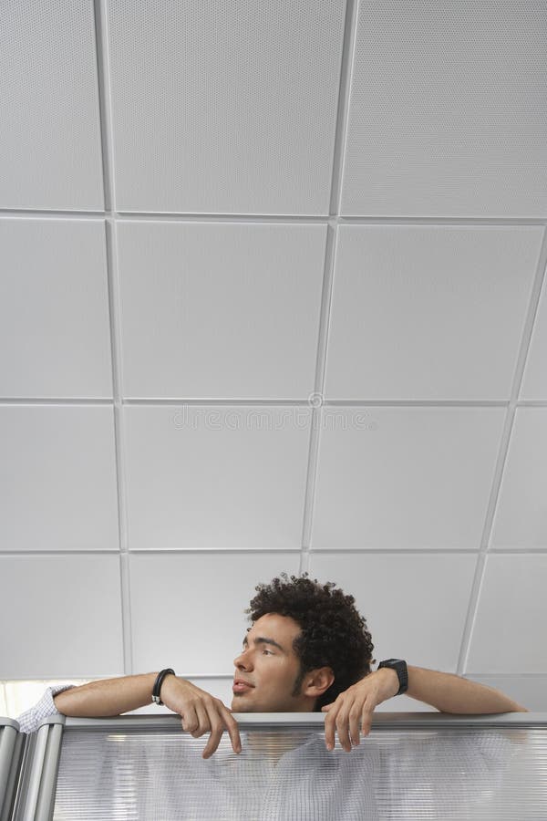 Office Worker Peering Over Cubicle Wall Stock Photo - Image of ...