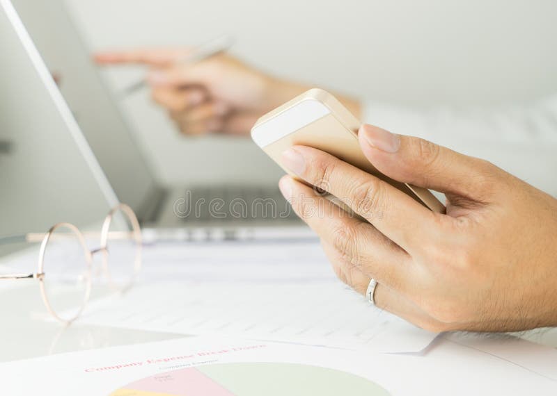 Office Worker is Pointing Information on Computer Screen and Making ...