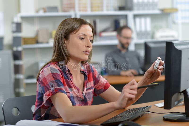 Office Worker Pointing Pen at Screen Stock Image - Image of staff ...