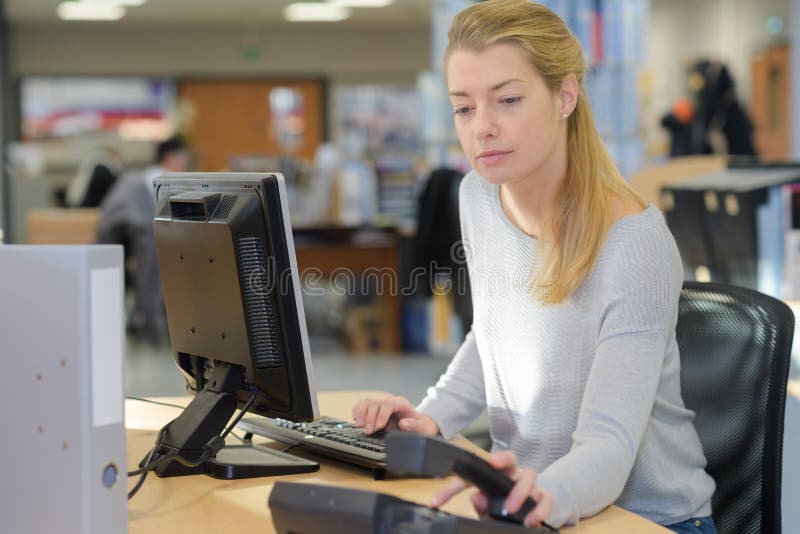 Office Worker Putting Down Phone Stock Photo - Image of center ...