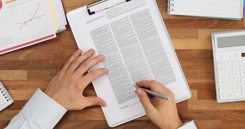 Office Worker Reviews Important Documents Placed on Table Stock Footage ...