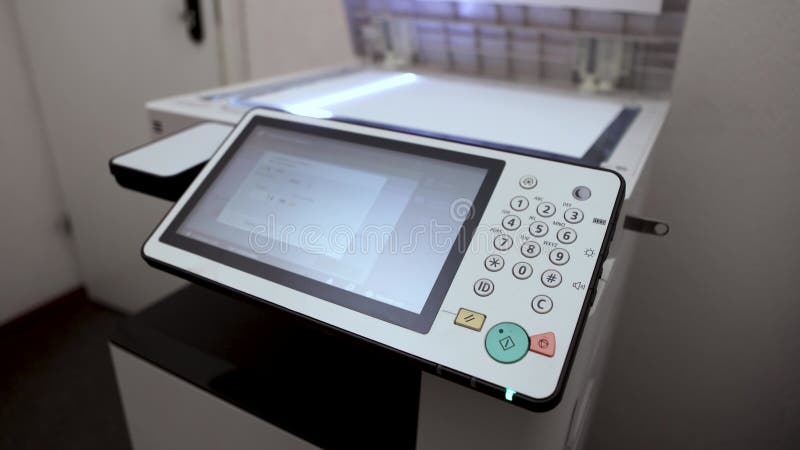 An Office Worker Scans a Sheet of A3 Paper on a Scanner Stock Footage ...