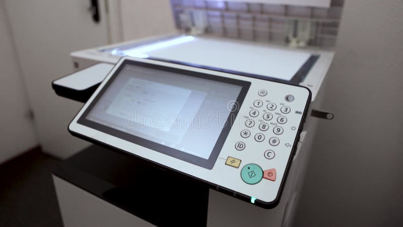 An Office Worker Scans a Sheet of A3 Paper on a Scanner Stock Video ...