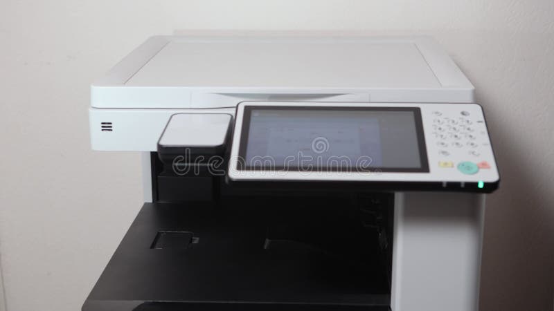 An Office Worker Scans a Sheet of A3 Paper on a Scanner Stock Footage ...