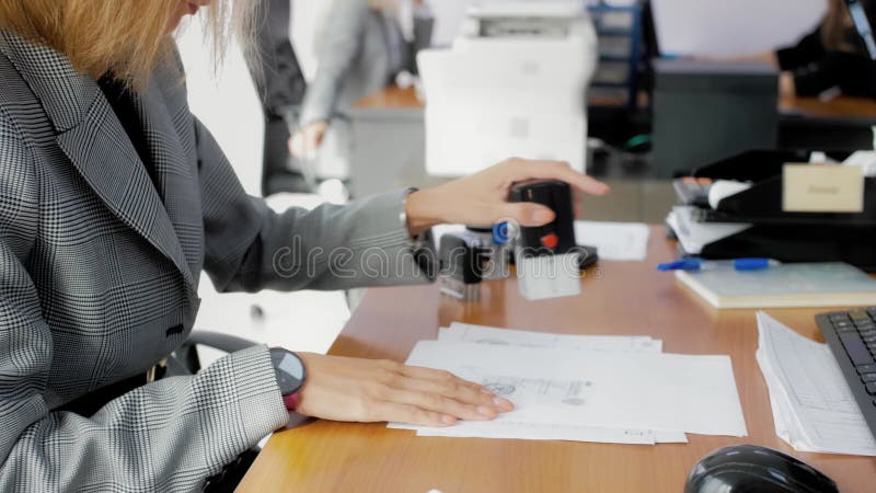 Office Worker Looks through Documents. Preparing Documents for the ...