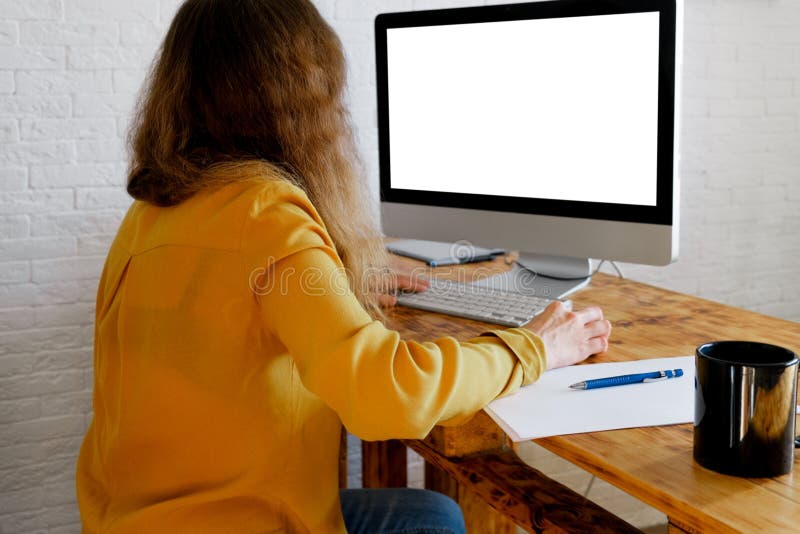 Young Woman Working on Computer. Back View. Stock Image - Image of ...