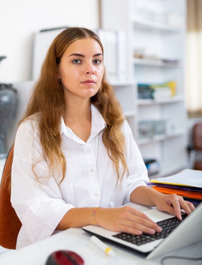 Office Worker Sitting at Desk in Office Stock Photo - Image of female ...