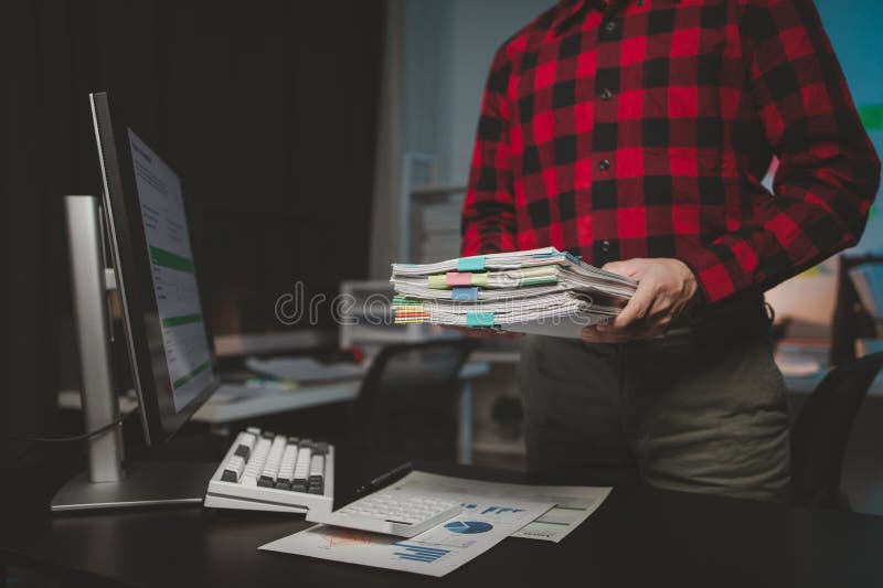Office Worker with Stacks of Documents, he is a Startup Company ...