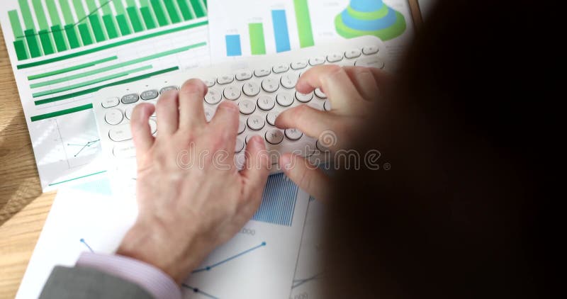 Office Worker Types Report on Computer Keyboard Sitting at Desk Stock ...