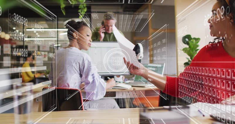Office Worker Typing Data on Desktop after Colleague Handing Papers ...