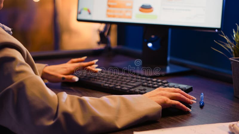 Office Worker Typing Financial Information on Computer Stock Image ...