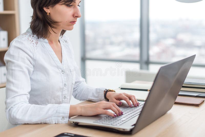 Office Worker Typing, Working at Her Workplace, Using Laptop. Stock ...