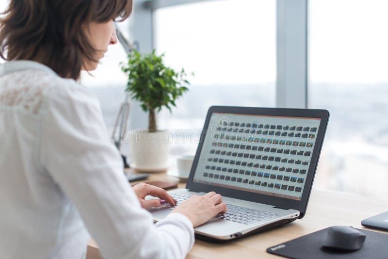 Office Worker Typing, Working at Her Workplace, Using Laptop. Stock ...