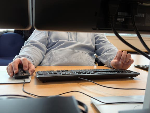 Office Worker Using Computer at Desk Stock Photo - Image of lazy ...