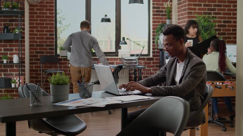 Office Worker Using Laptop To Send Paperwork Email Stock Video - Video ...