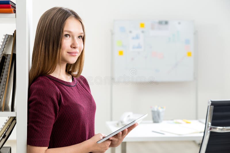 Office worker using tablet stock photo. Image of leaning - 73449942
