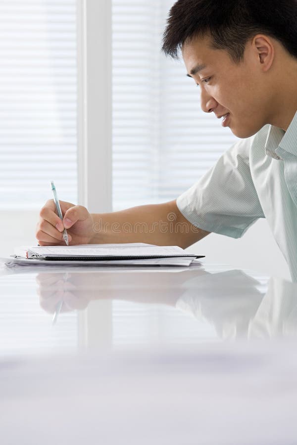 Office worker writing stock photo. Image of chinese, employee - 62808104