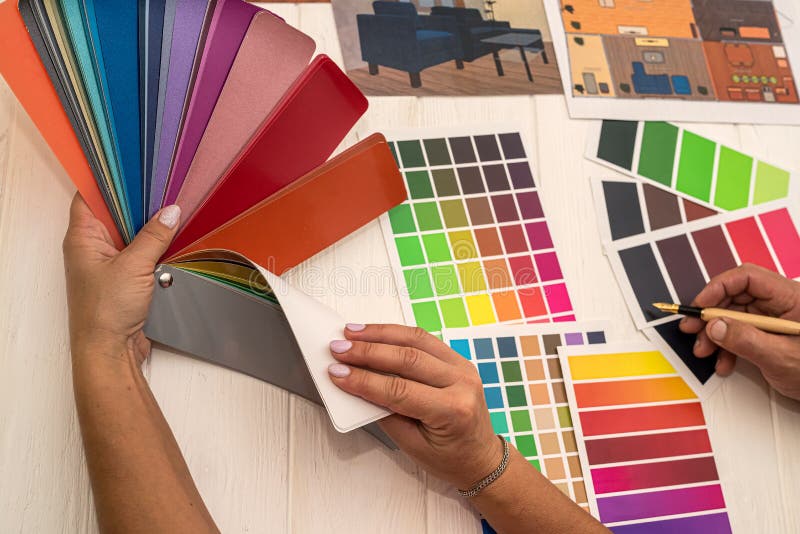 Office Workers Consider a Palette of Colors that are Selected for the ...