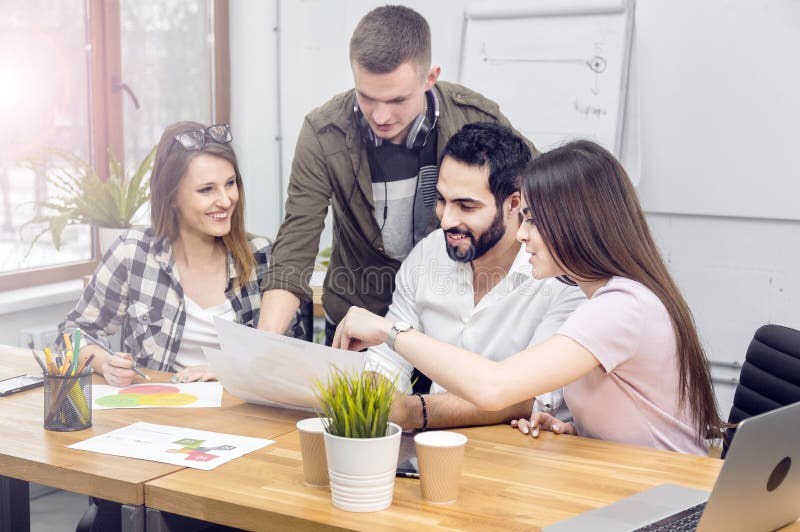 Office Workers Discuss Diagrams Stock Photo - Image of design, brunette ...