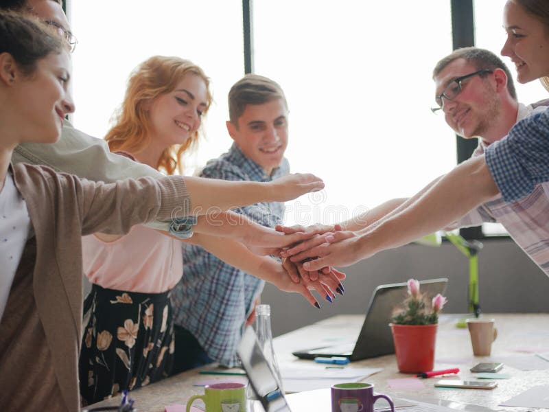 Office Workers Join Hands for a Good Start Stock Image - Image of ...