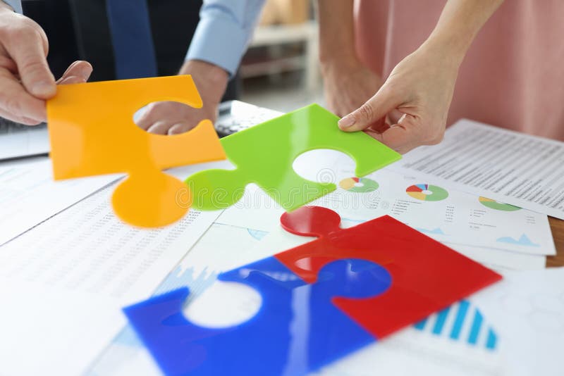 Office Workers Put Together Bright Jigsaw Elements Stock Photo - Image ...