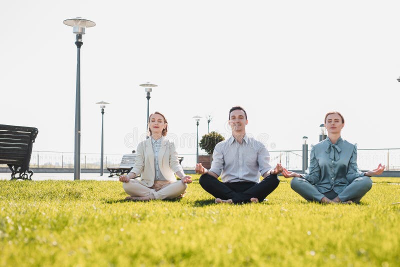 Office Workers Relaxing in the City Park during the Break Stock Photo ...